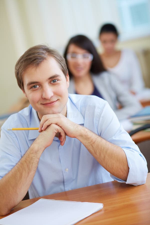 Handsome Male Student in a Library Stock Photo - Image of indoor ...