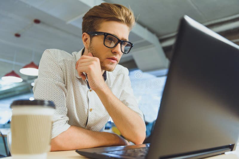Smart Guy Working on Computer in Cafe Stock Image - Image of face ...