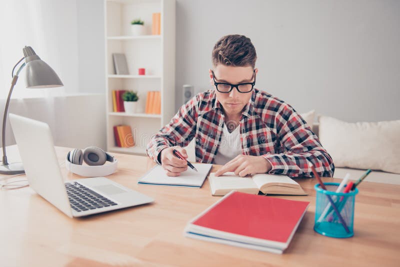 Smart Handsome Young Man with Notebook Writing a Lecture Stock Photo ...