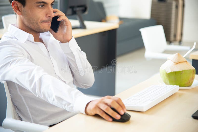Blur Smart and Happy Business Man Using Smartphone while Working with ...