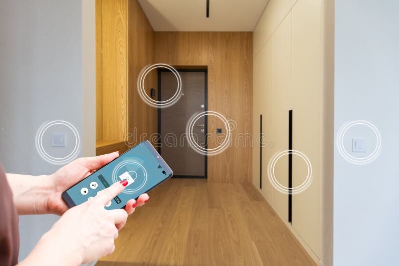 Smart Home Automation App on Smartphone Hold by Female Hand with Home ... Smart Home Automation App on Smartphone Hold by Female Hand with Home ...