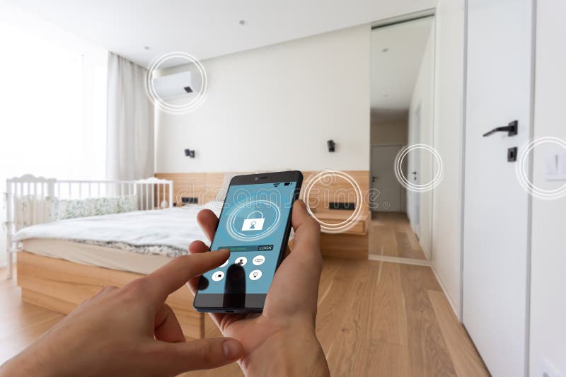 Smart Home Automation App on Smartphone Hold by Female Hand with Home ... Smart Home Automation App on Smartphone Hold by Female Hand with Home ...