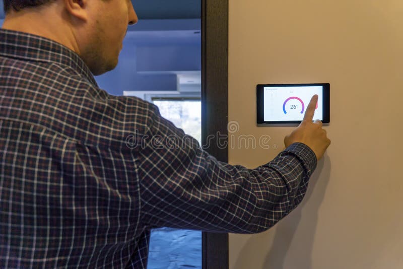 Smart Home Climate Control Device on a Wall Stock Image - Image of ...