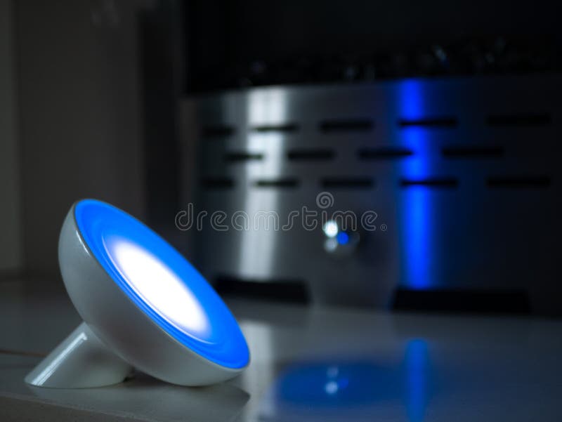 Smart Home Lamp Light with Coloured LED on Fireplace - Dark Blue Stock ...