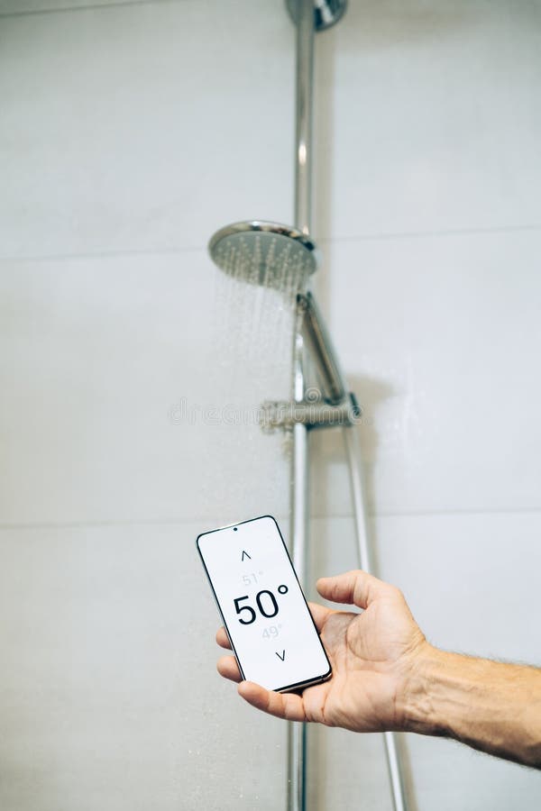 Smart Home: Man Controlling Heating Using App Stock Image - Image of ...