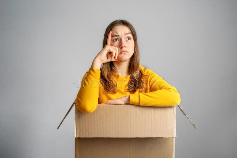 Smart Idea Concept. Teenager Student Girl Sitting Inside Box Looking Up ...