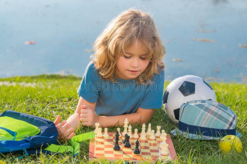 Smart Kid Playing Chess. Clever Child Thinking about Chess. Stock Image ...