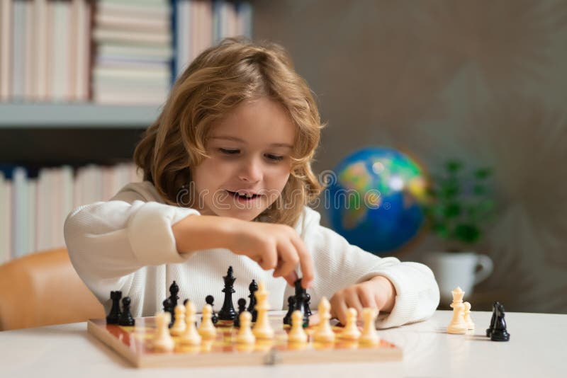 Smart Kid Playing Chess. Clever Child Thinking about Chess. Stock Photo ...