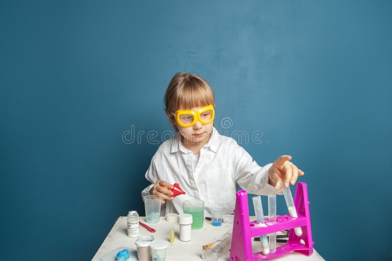 Smart Kid Student in Scientist Uniform and Glasses Studying Science ...