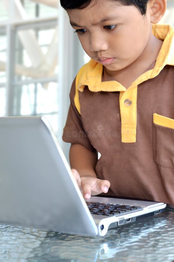 Smart Kid Using Laptop Computer Stock Photo - Image of south, cute ...