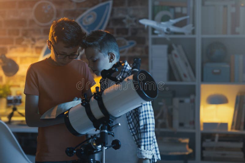 Smart Kids Using a Telescope and Stargazing Stock Photo - Image of ...