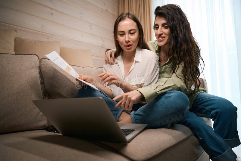 Young Smiling Women Doing Paperwork or Studying Stock Photo - Image of pretty, contract: 285470568