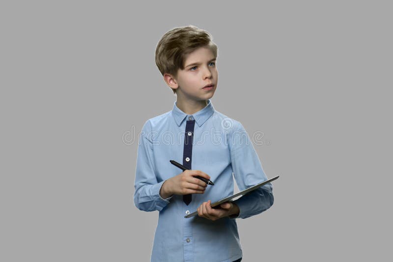 Smart Little Boy Working on Tablet Device. Stock Image - Image of ...