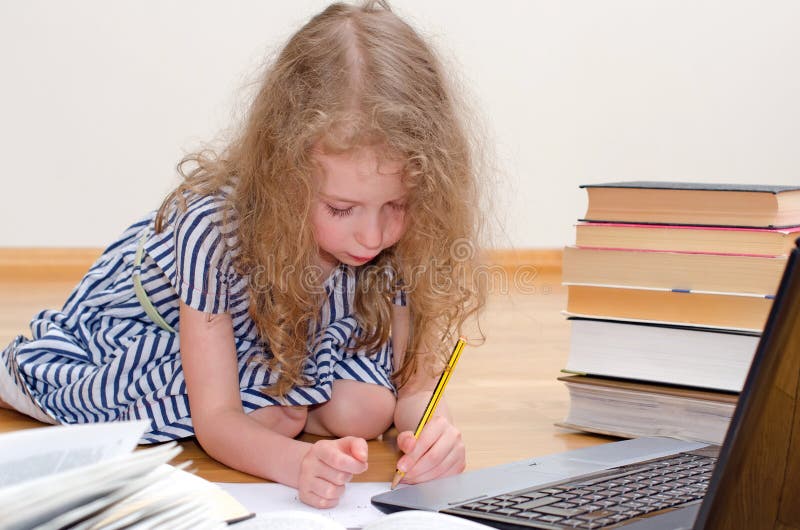 Smart Little Girl Writes Diploma. Stock Image - Image of intellectual ...