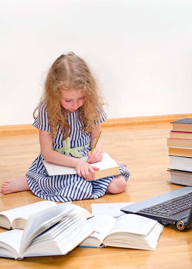 Smart Little Girl Writes Diploma. Stock Image - Image of girl ...