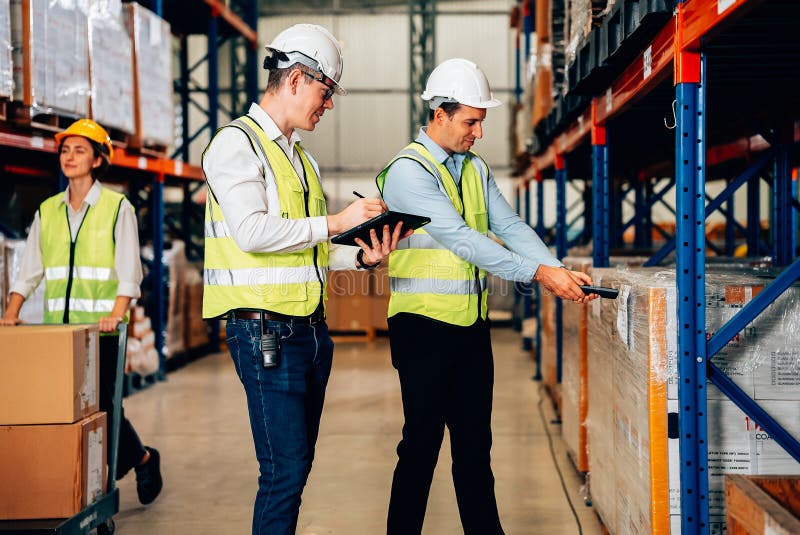 Smart Male Engineer Manager Wearing Safety Vest and Helmet Using ...