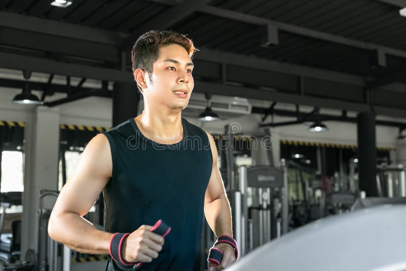 Smart Man Running on Treadmill in Gym. Stock Photo - Image of happy ...