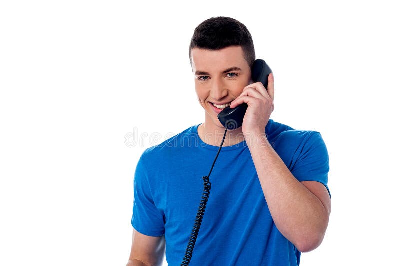 Young Guy on the Mobile Phone Stock Photo - Image of friendly ...