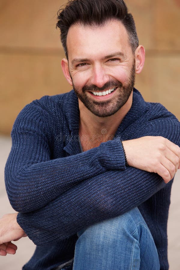 Smart Mature Man Sitting Outdoors and Smiling Stock Photo - Image of ...