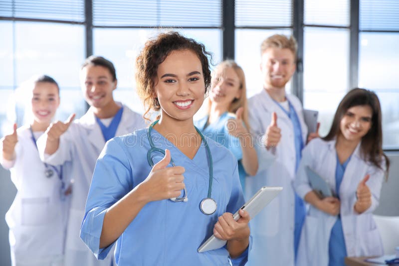Smart Medical Student with Her Classmates Stock Photo - Image of class ...