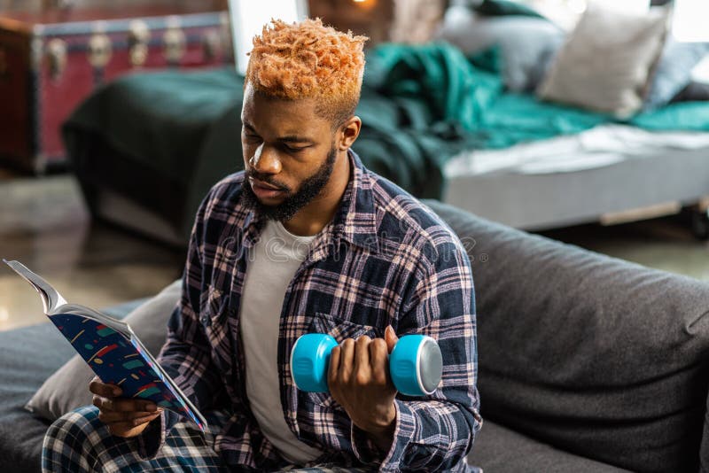 Smart Nice Man Doing an Exercise with a Dumbbell Stock Photo - Image of ...