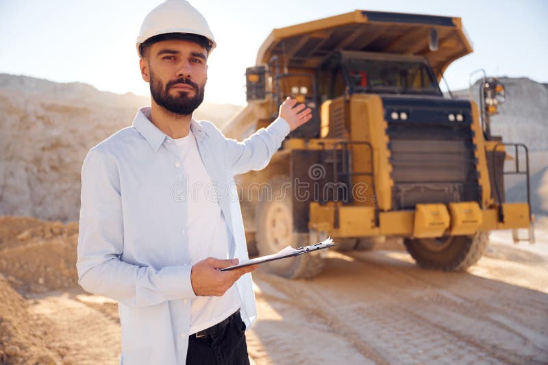 Smart Person is with Documents in Hands. Man in Uniform is Working in ...