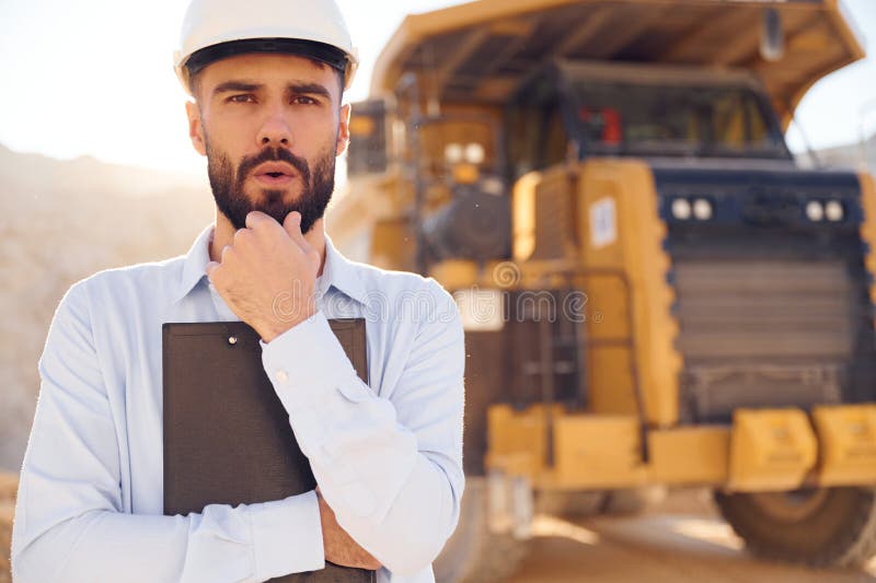 Smart Person is with Documents in Hands. Man in Uniform is Working in ...