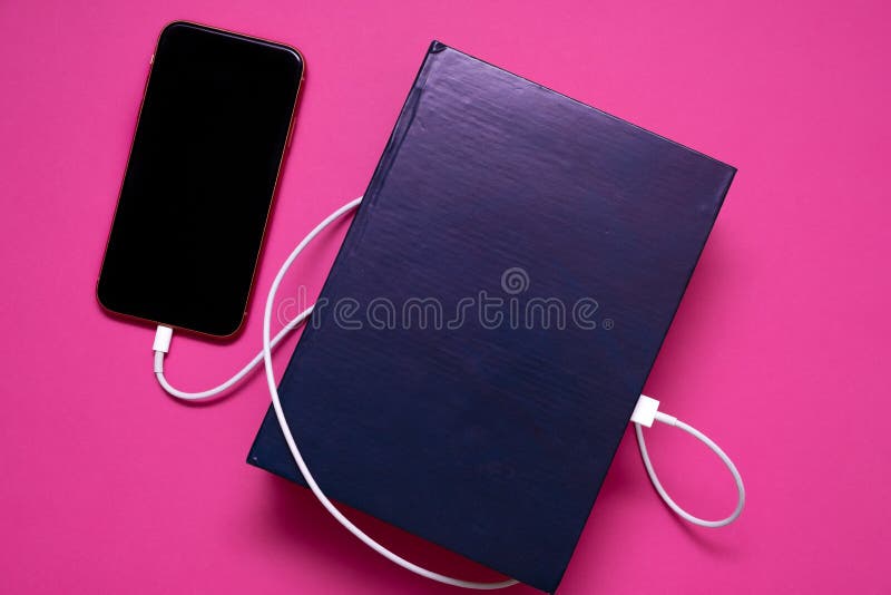 Smart Phone Connected To the Old Book with a Cable, and Download ...