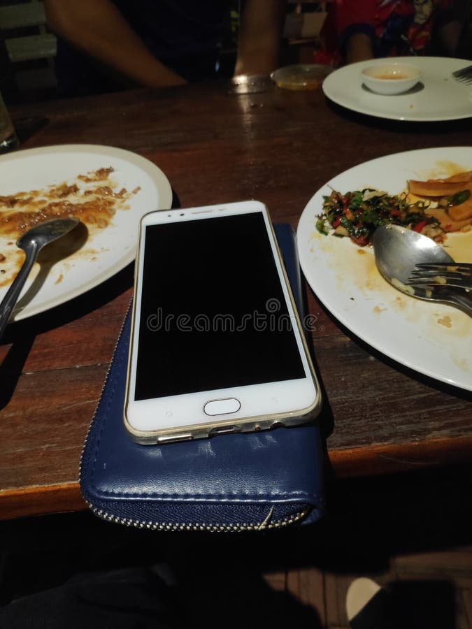 Smart Phone on the Dining Table Stock Image - Image of phone, light ...