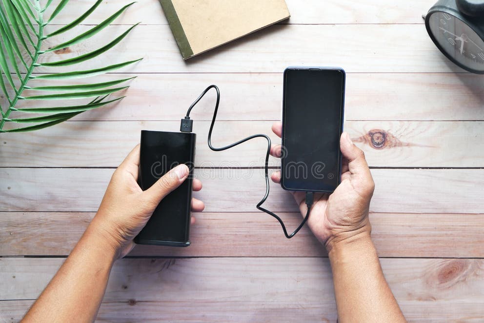 Smart Phone with Empty Screen Charging with Power Bank Top View Stock ...