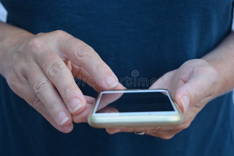 Using a the Touchscreen of a Mobile Phone, Outdoors Stock Image - Image ...