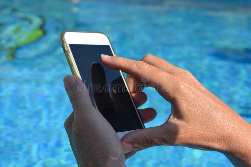 Woman in Pool Holding Phone with an Isolated Screen Stock Photo - Image ...
