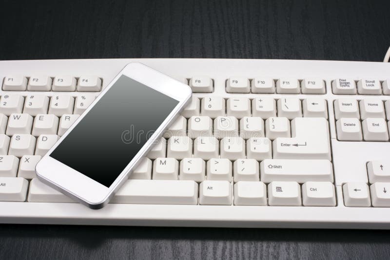 Smart phone and keyboard stock photo. Image of item, personal - 57894548