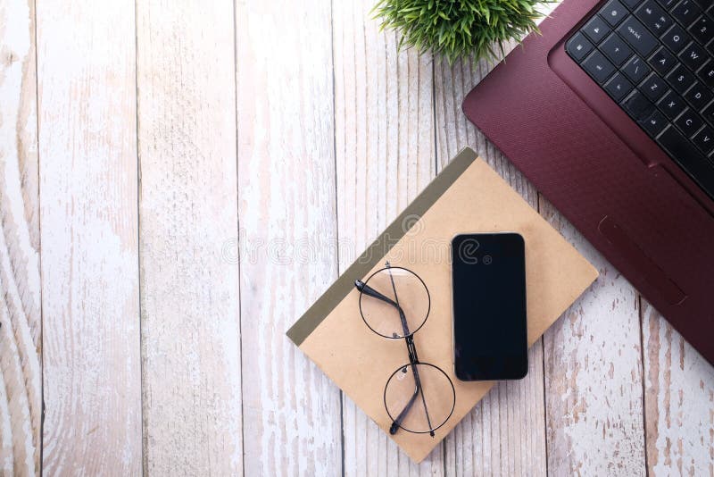 Smart Phone, Laptop and Notepad on Table with Copy Space Stock Image ...