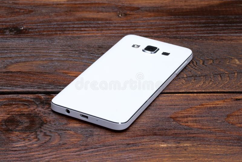 Smart Phone Lying on Wooden Table Stock Photo - Image of call, modern ...