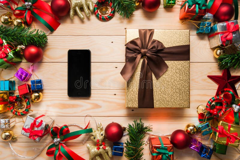 Smart Phone Mock Up and Gift Box with Christmas Decorations Stock Image ...