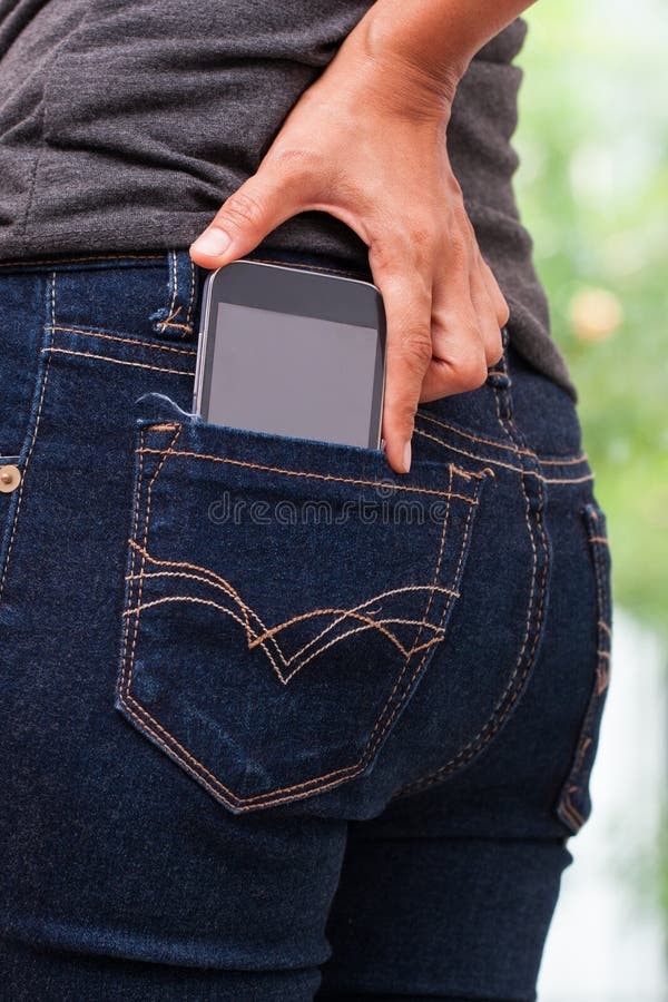 Smart phone in pocket stock image. Image of portable - 72734703