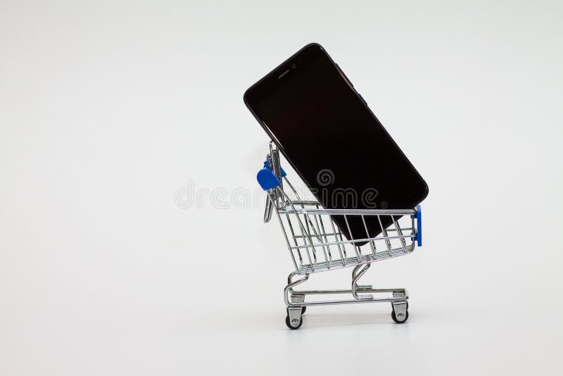 Smart Phone on Shopping Cart Stock Photo - Image of cart, concept ...