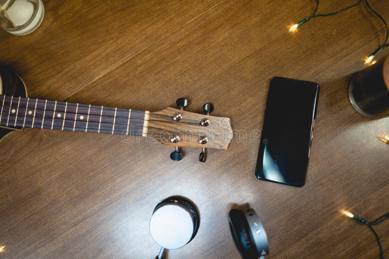 Smart Phone on Table with Decor Stock Image - Image of headphones ...