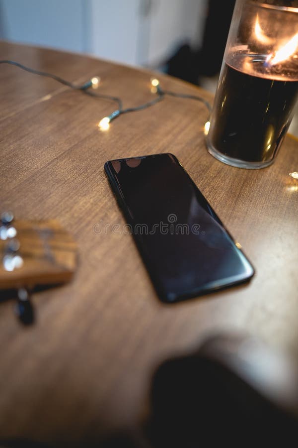 Smart Phone on Table with Decor Stock Photo - Image of headphone, smart ...