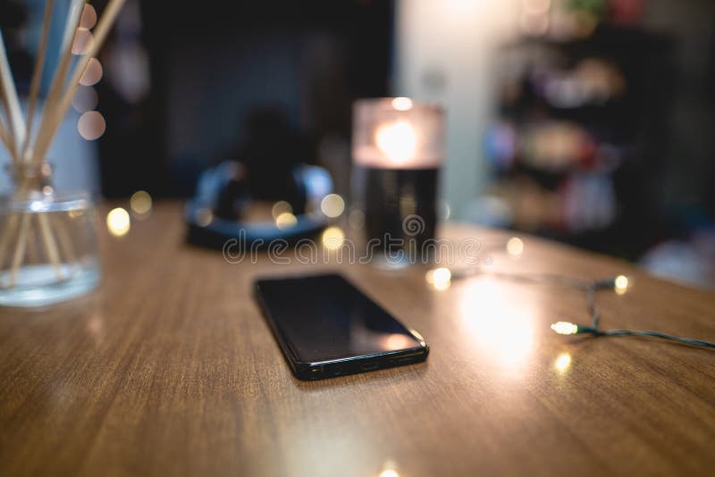Smart Phone on Table with Decor Stock Image - Image of headphones ...