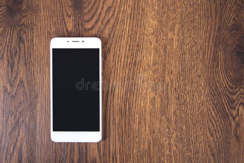 Smart phone on the table stock photo. Image of black - 177320868