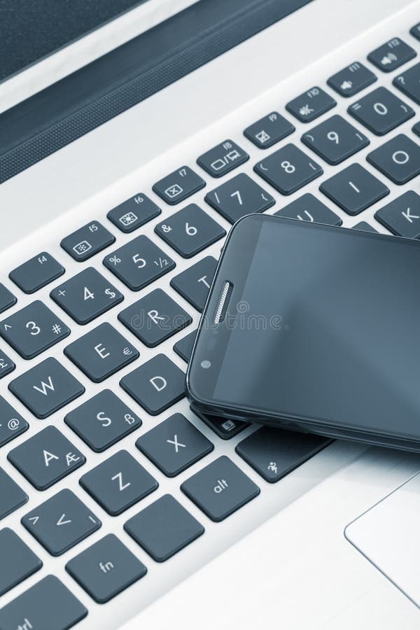 Smart Phone on Tablet Computer. Technology and Communication Con Stock ...