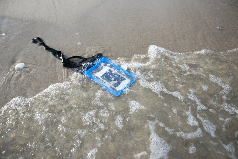 Smart phone in the water stock image. Image of telephone - 95489427