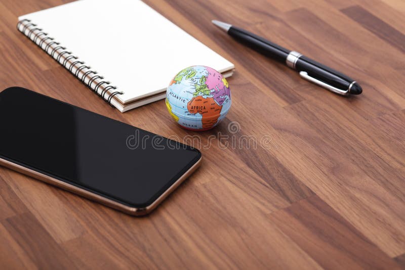 Smart Phone with World Map and Notebook Stock Image - Image of concept ...