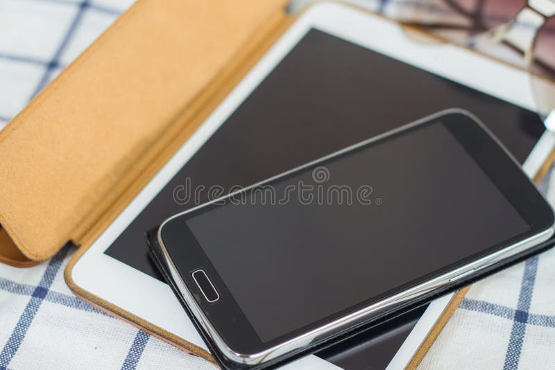 Smart Phones, Tablets on Table. Stock Photo - Image of table, planning ...