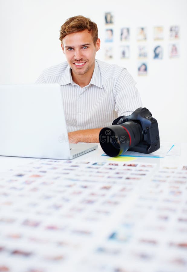 Smart Photographer Using Laptop. Portrait of Smart Male Photographer ...