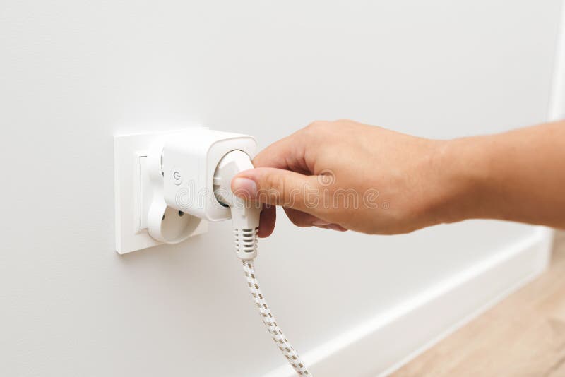 Smart Plug into the Socket. Electricity Expenses Stock Photo - Image of ...