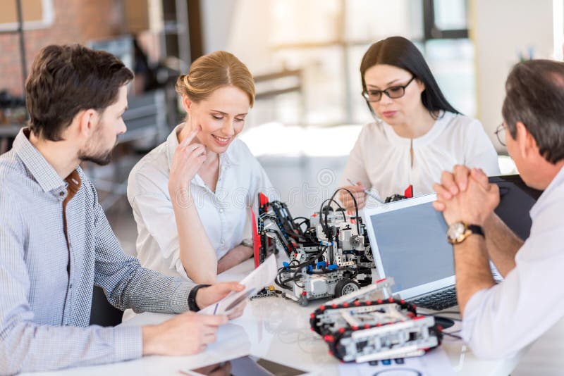 Smart Positive Team Creating Modern Technologies Stock Photo - Image of ...