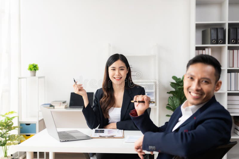 Smart and Professional Male Manager Working with His Female Assistant ...